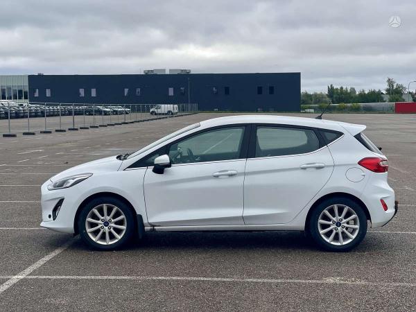 Ford Fiesta 2018 in Vilnius on AUTOMOTO.COM.LV White Ford Fiesta 2018 in Vilnius, with an engine capacity of 1.00 L and mileage of 180 thousand km for 3500 €, photo 9 on AUTOMOTO.COM.LV
