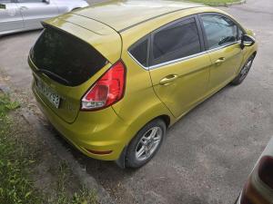 Yellow Ford Fiesta 2013 in Siauliai, with an engine capacity of 1.00 L and mileage of 252 thousand km for 1350 €, photo 3 on AUTOMOTO.COM.LV