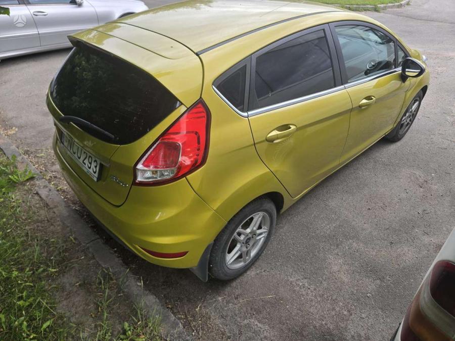 Yellow Ford Fiesta 2013 in Siauliai, with an engine capacity of 1.00 L and mileage of 252 thousand km for 1350 €, photo 3 on AUTOMOTO.COM.LV
