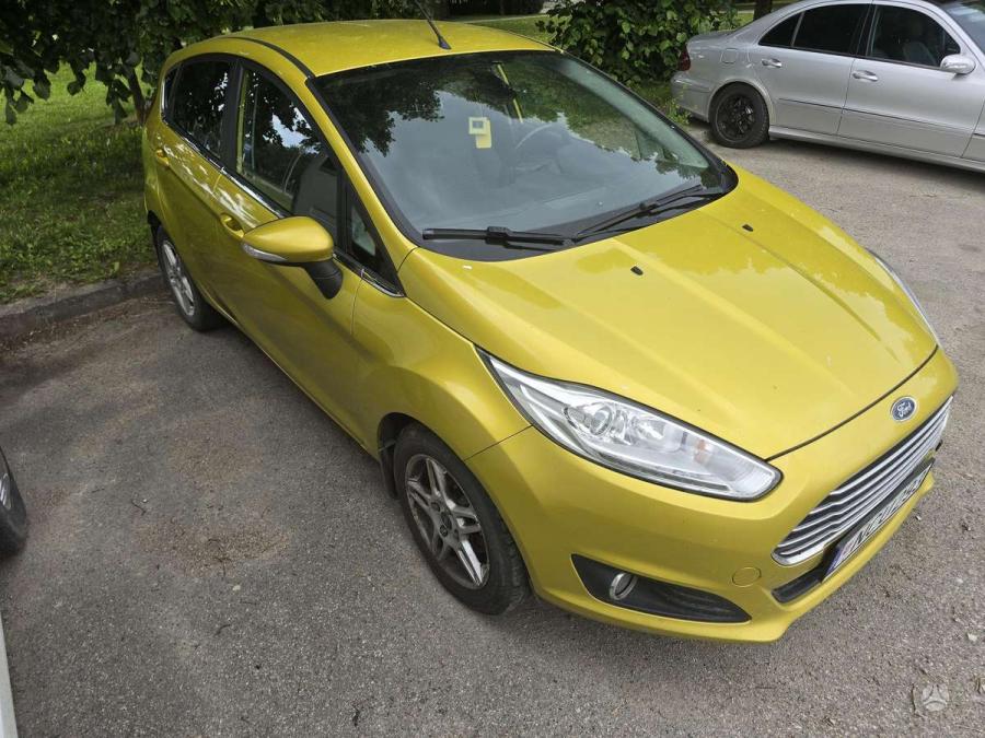 Yellow Ford Fiesta 2013 in Siauliai, with an engine capacity of 1.00 L and mileage of 252 thousand km for 1350 €, photo 4 on AUTOMOTO.COM.LV