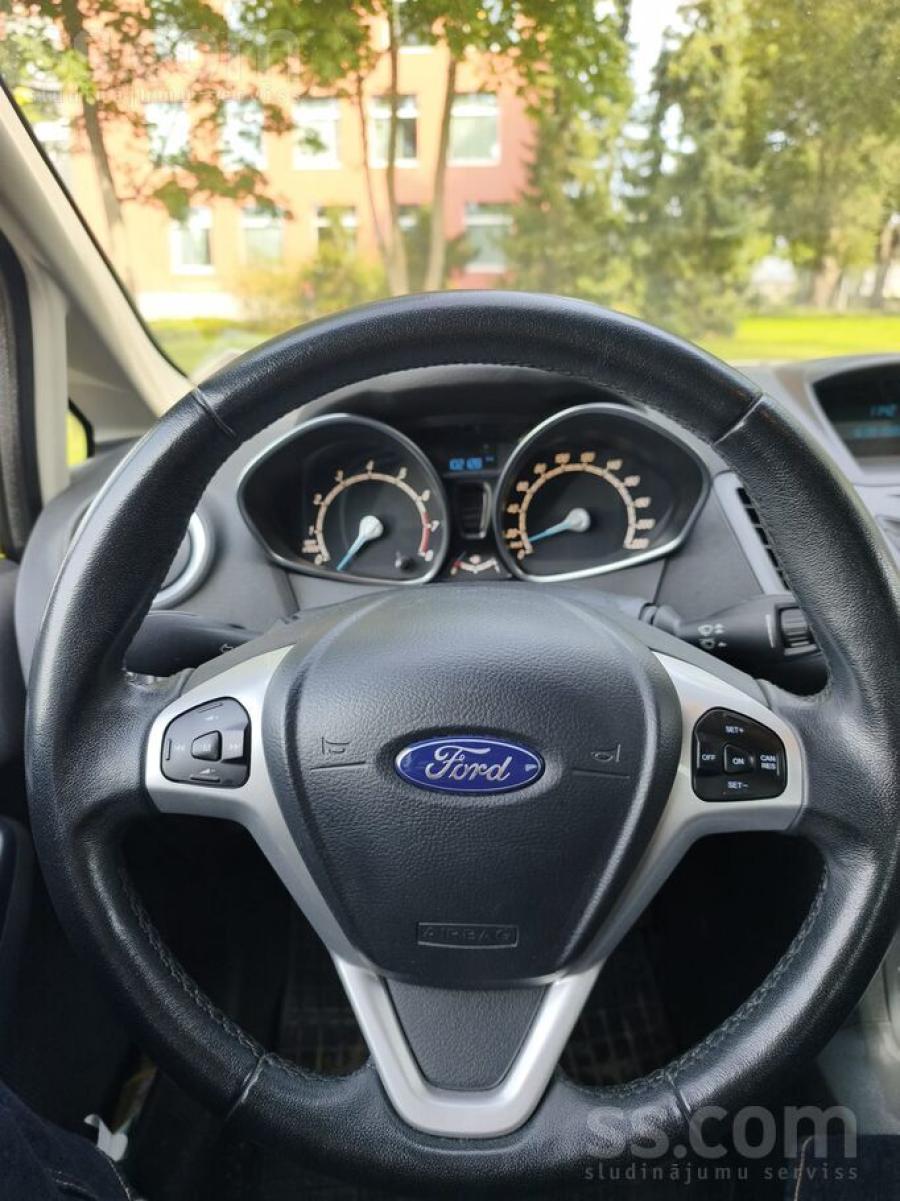Yellow Ford Fiesta 2015 in Riga, with an engine capacity of 1.00 L and mileage of 102 thousand km for 5150 €, photo 7 on AUTOMOTO.COM.LV