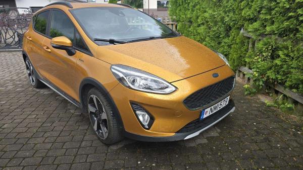 Yellow Ford Fiesta 2018 in Kaunas, with an engine capacity of 1.00 L and mileage of 150 thousand km for 9300 €, photo 1 on AUTOMOTO.COM.LV