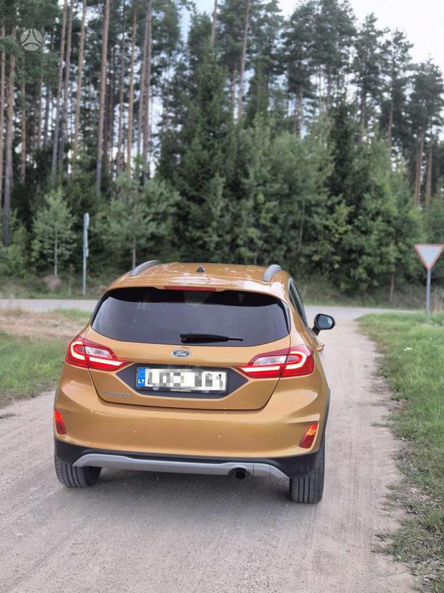 Yellow Ford Fiesta 2019 in Alytus, with an engine capacity of 1.00 L and mileage of 134 thousand km for 9900 €, photo 5 on AUTOMOTO.COM.LV