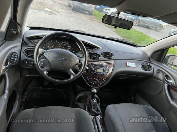 Ford Focus 1999 in Narva on AUTOMOTO.COM.LV Black Ford Focus 1999 in Narva, with an engine capacity of 1.80 L and mileage of 250 thousand km for 499 €, photo 11 on AUTOMOTO.COM.LV