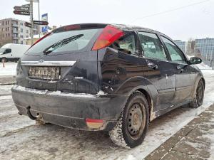 Black Ford Focus 2002 in Vilnius, with an engine capacity of 1.80 L and mileage of 215 thousand km for 300 €, photo 3 on AUTOMOTO.COM.LV