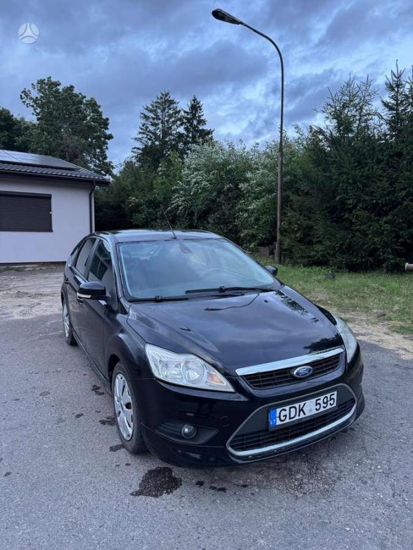 Black Ford Focus 2008 in Vilnius, with an engine capacity of 1.60 L and mileage of 193 thousand km for 1350 €, photo 3 on AUTOMOTO.COM.LV