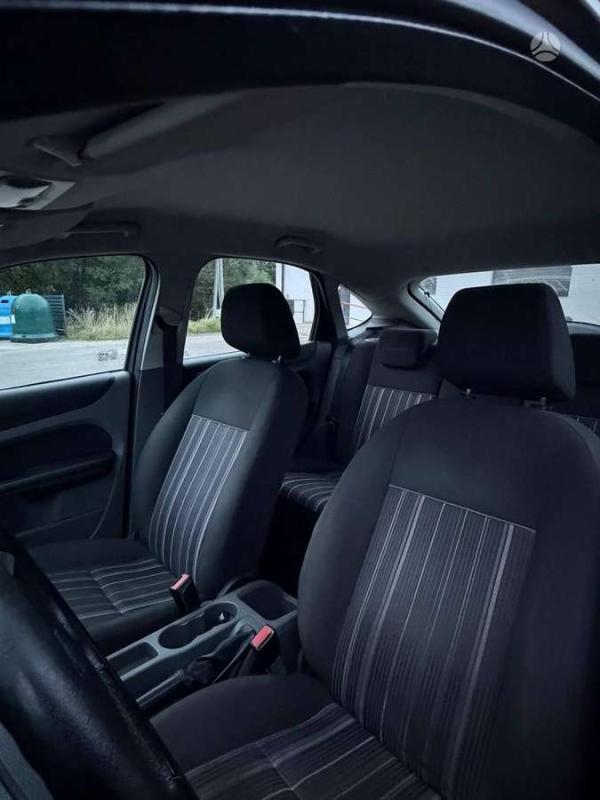 Black Ford Focus 2008 in Vilnius, with an engine capacity of 1.60 L and mileage of 193 thousand km for 1350 €, photo 5 on AUTOMOTO.COM.LV