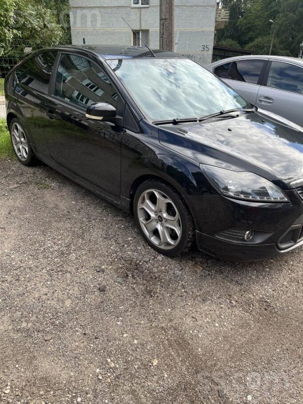 Black Ford Focus 2009 in Riga, with an engine capacity of 2.00 L and mileage of 251 thousand km for 1400 €, photo 2 on AUTOMOTO.COM.LV