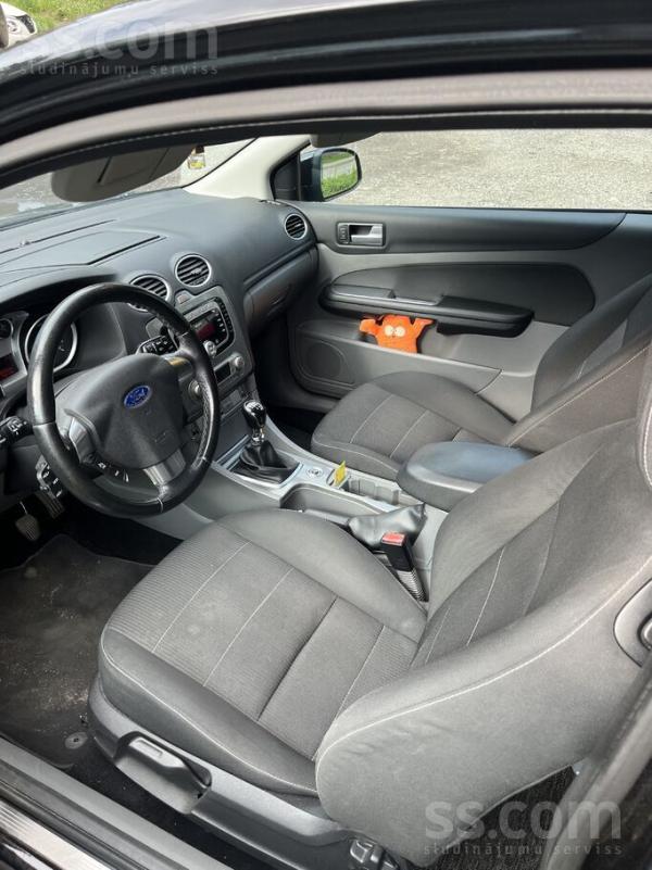 Black Ford Focus 2009 in Riga, with an engine capacity of 2.00 L and mileage of 251 thousand km for 1400 €, photo 5 on AUTOMOTO.COM.LV