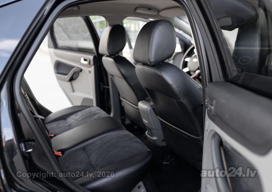 Black Ford Focus 2009 in Tallinn, with an engine capacity of 2.00 L and mileage of 290 thousand km for 2299 €, photo 18 on AUTOMOTO.COM.LV