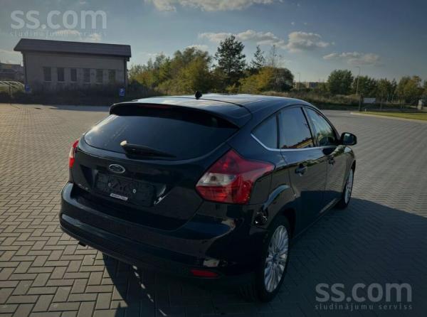 Black Ford Focus 2011 in Telschi, with an engine capacity of 1.60 L and mileage of 231 thousand km for 3999 €, photo 6 on AUTOMOTO.COM.LV