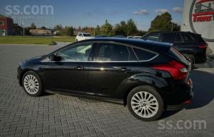Black Ford Focus 2011 in Telschi, with an engine capacity of 1.60 L and mileage of 231 thousand km for 3999 €, photo 9 on AUTOMOTO.COM.LV