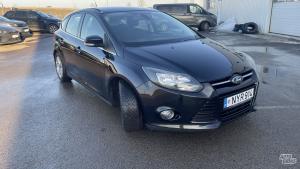 Black Ford Focus 2011 in Marijampole, with an engine capacity of 1.60 L and mileage of 260 thousand km for 2990 €, photo 5 on AUTOMOTO.COM.LV