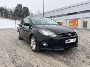 Black Ford Focus 2012 in Vilnius, with an engine capacity of 1.60 L and mileage of 330 thousand km for 3250 €, photo 3 on AUTOMOTO.COM.LV