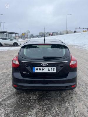 Black Ford Focus 2012 in Vilnius, with an engine capacity of 1.60 L and mileage of 330 thousand km for 3250 €, photo 6 on AUTOMOTO.COM.LV