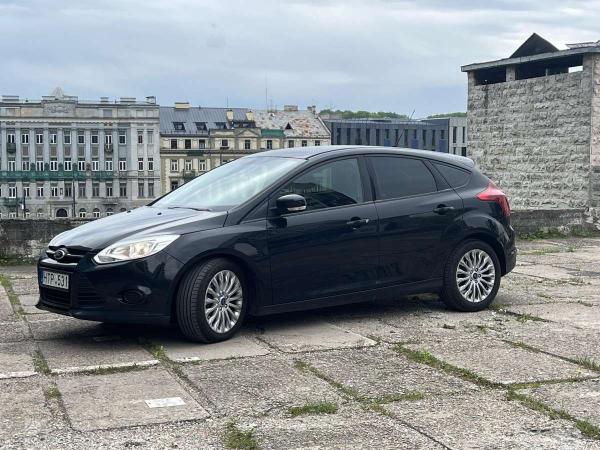 Black Ford Focus 2012 in Vilnius, with an engine capacity of 1.56 L and mileage of 214 thousand km for 2100 €, photo 2 on AUTOMOTO.COM.LV