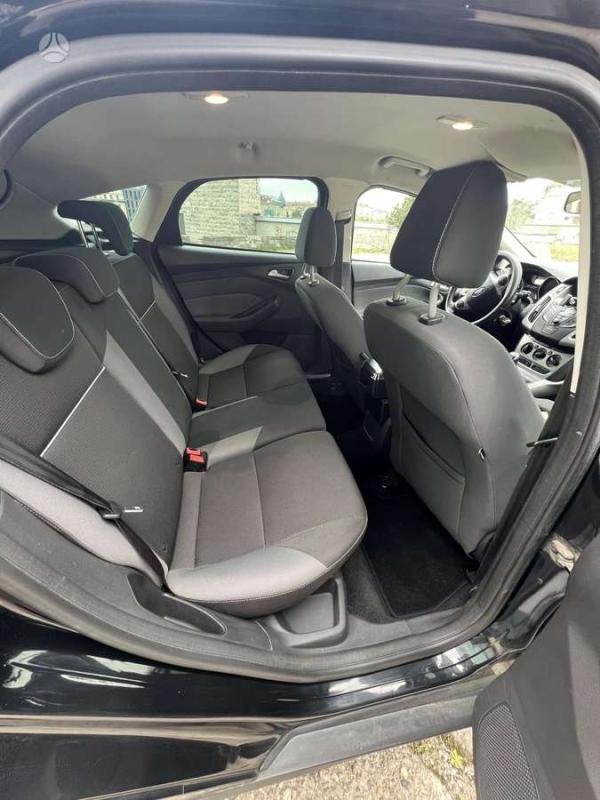 Black Ford Focus 2012 in Vilnius, with an engine capacity of 1.56 L and mileage of 214 thousand km for 2100 €, photo 7 on AUTOMOTO.COM.LV
