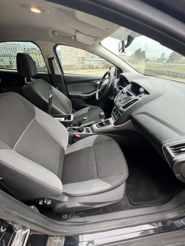 Black Ford Focus 2012 in Vilnius, with an engine capacity of 1.56 L and mileage of 214 thousand km for 2100 €, photo 8 on AUTOMOTO.COM.LV