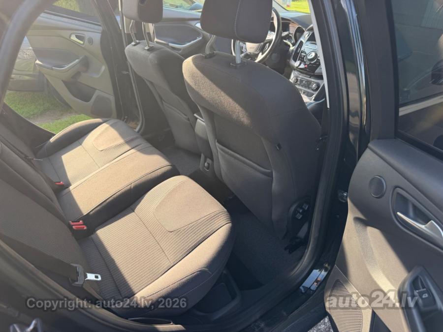 Black Ford Focus 2012 in Tallinn, with an engine capacity of 1.60 L and mileage of 255 thousand km for 3700 €, photo 11 on AUTOMOTO.COM.LV