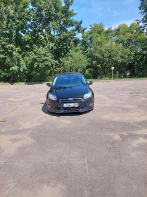 Black Ford Focus 2012 in Vilnius, with an engine capacity of 1.56 L and mileage of 207 thousand km for 3790 €, photo 23 on AUTOMOTO.COM.LV