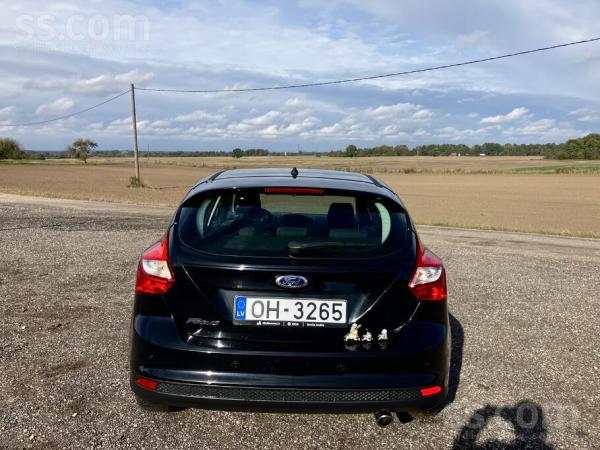 Black Ford Focus 2013 in Talsi, with an engine capacity of 2.00 L and mileage of 207 thousand km for 6999 €, photo 4 on AUTOMOTO.COM.LV