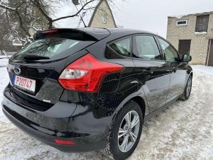 Black Ford Focus 2013 in Prienai, with an engine capacity of 1.00 L and mileage of 150 thousand km for 3300 €, photo 4 on AUTOMOTO.COM.LV