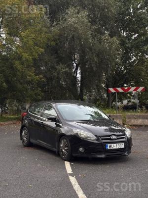 Black Ford Focus 2013 in Riga, with an engine capacity of 1.60 L and mileage of 406 thousand km for 2150 €, photo  on AUTOMOTO.COM.LV