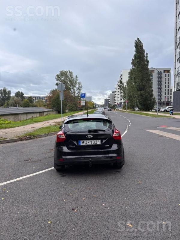 Black Ford Focus 2013 in Riga, with an engine capacity of 1.60 L and mileage of 406 thousand km for 2150 €, photo 5 on AUTOMOTO.COM.LV
