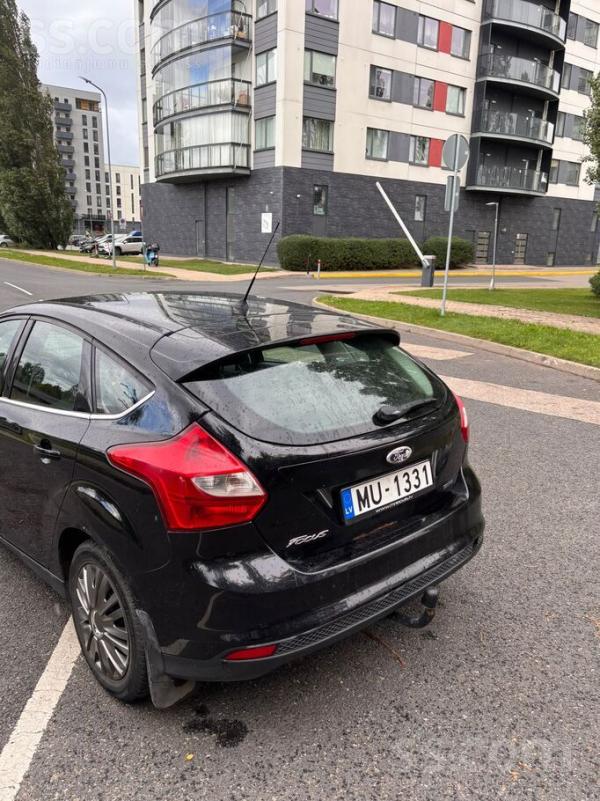 Black Ford Focus 2013 in Riga, with an engine capacity of 1.60 L and mileage of 406 thousand km for 2150 €, photo 6 on AUTOMOTO.COM.LV