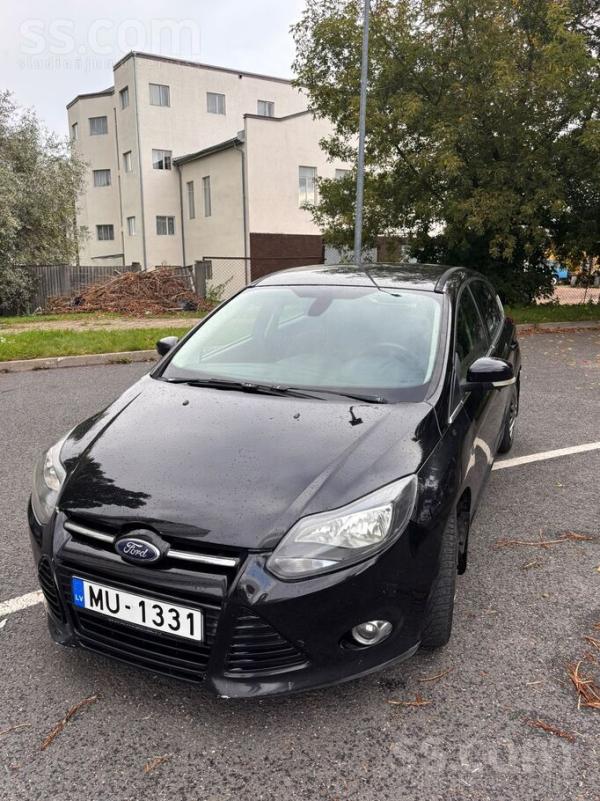 Black Ford Focus 2013 in Riga, with an engine capacity of 1.60 L and mileage of 406 thousand km for 2150 €, photo 7 on AUTOMOTO.COM.LV