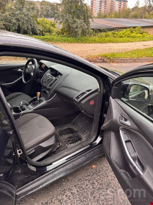 Black Ford Focus 2013 in Riga, with an engine capacity of 1.60 L and mileage of 406 thousand km for 2150 €, photo 11 on AUTOMOTO.COM.LV