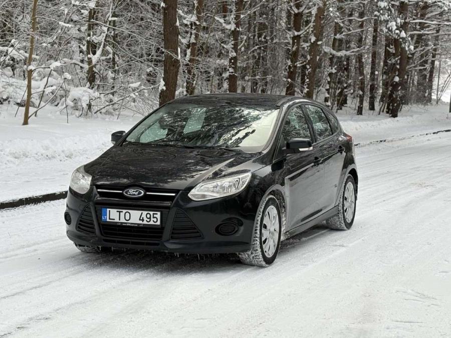 Black Ford Focus 2014 in Vilnius, with an engine capacity of 1.56 L and mileage of 294 thousand km for 2850 €, photo 1 on AUTOMOTO.COM.LV