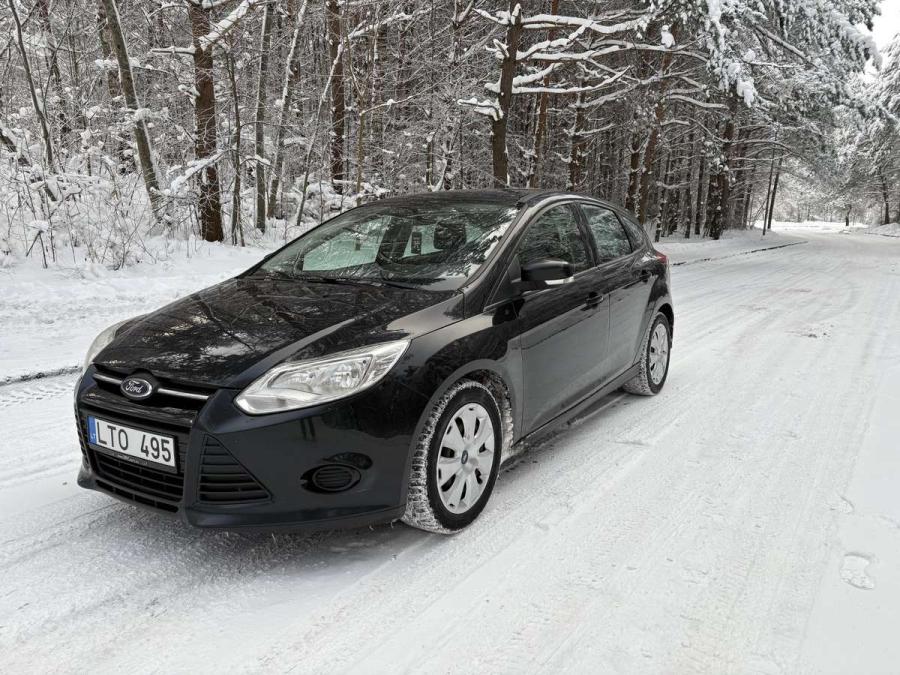 Black Ford Focus 2014 in Vilnius, with an engine capacity of 1.56 L and mileage of 294 thousand km for 2850 €, photo 5 on AUTOMOTO.COM.LV