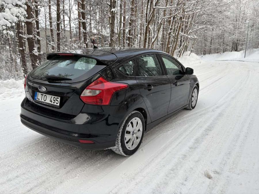 Black Ford Focus 2014 in Vilnius, with an engine capacity of 1.56 L and mileage of 294 thousand km for 2850 €, photo 8 on AUTOMOTO.COM.LV