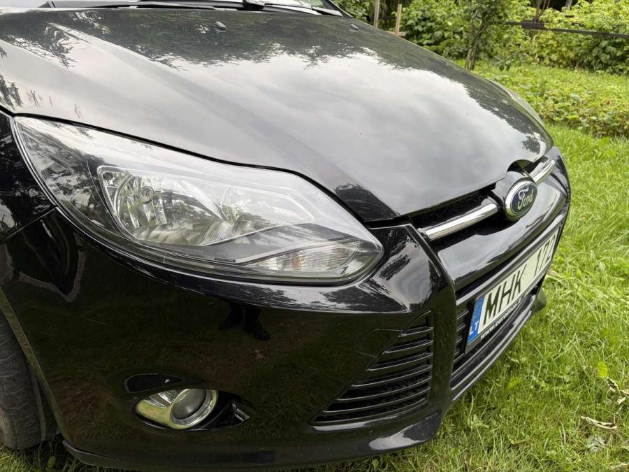 Black Ford Focus 2014 in Kaunas, with an engine capacity of 1.00 L and mileage of 119 thousand km for 3900 €, photo 4 on AUTOMOTO.COM.LV
