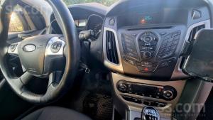 Black Ford Focus 2014 in Cesis, with an engine capacity of 1.60 L and mileage of 161 thousand km for 4200 €, photo 19 on AUTOMOTO.COM.LV