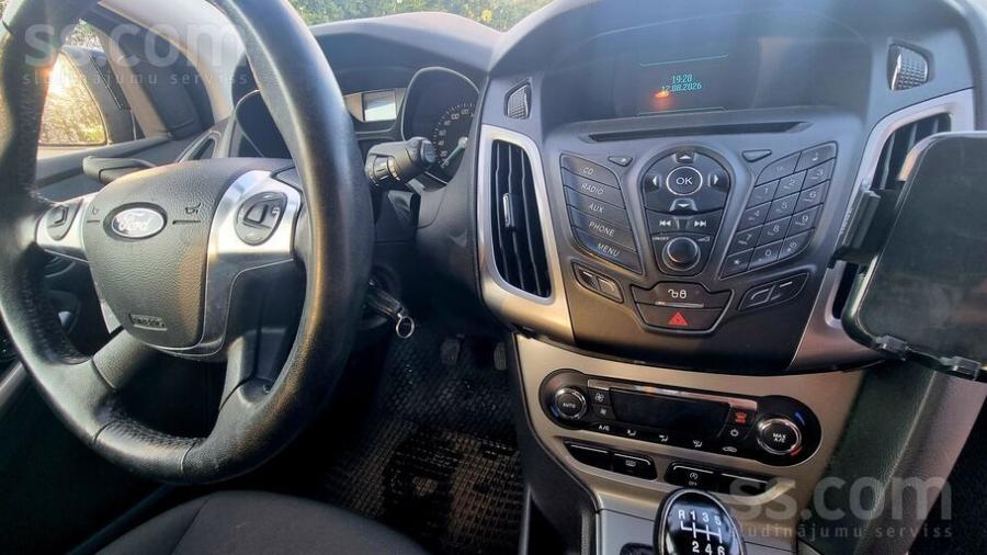 Black Ford Focus 2014 in Cesis, with an engine capacity of 1.60 L and mileage of 161 thousand km for 4200 €, photo 19 on AUTOMOTO.COM.LV