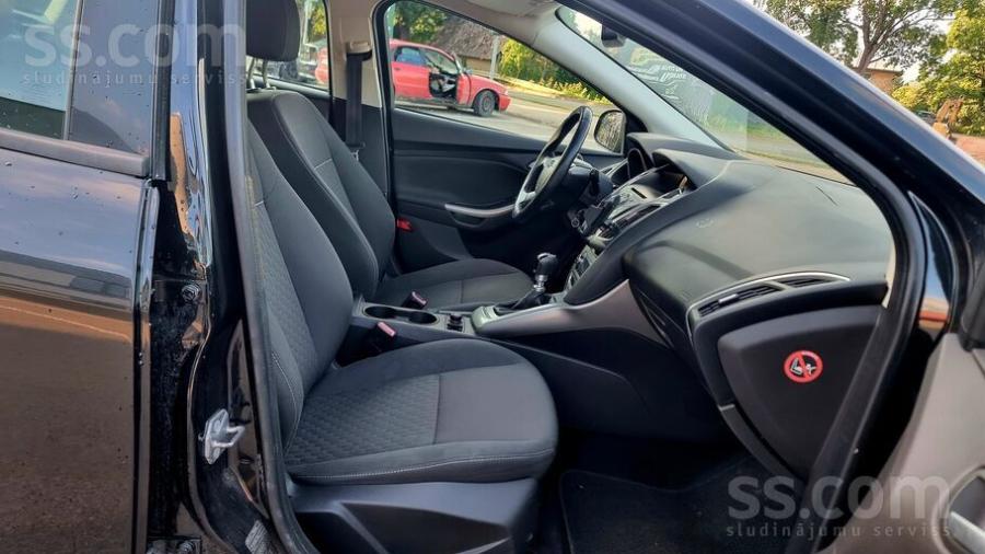 Black Ford Focus 2014 in Cesis, with an engine capacity of 1.60 L and mileage of 161 thousand km for 4200 €, photo 22 on AUTOMOTO.COM.LV