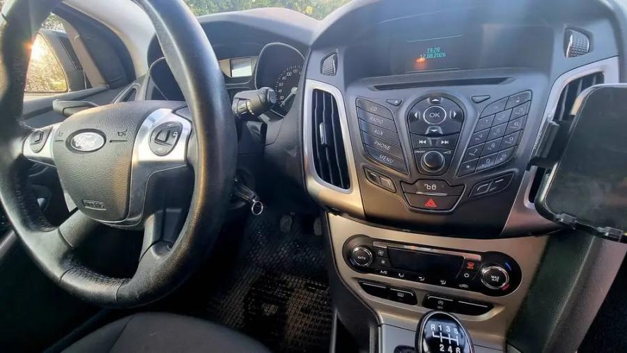 Black Ford Focus 2014 in Cesis, with an engine capacity of 1.60 L and mileage of 161 thousand km for 4200 €, photo 19 on AUTOMOTO.COM.LV