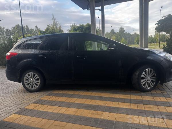 Black Ford Focus 2014 in Tukums, with an engine capacity of 1.60 L and mileage of 306 thousand km for 2650 €, photo 8 on AUTOMOTO.COM.LV