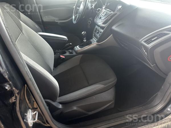Black Ford Focus 2014 in Tukums, with an engine capacity of 1.60 L and mileage of 306 thousand km for 2650 €, photo 10 on AUTOMOTO.COM.LV
