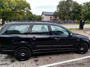 Black Ford Focus 2000 in Riga, with an engine capacity of 1.60 L and mileage of 275 thousand km for 500 €, photo 5 on AUTOMOTO.COM.LV