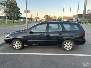 Black Ford Focus 2004 in Kaunas, with an engine capacity of 1.80 L and mileage of 321 thousand km for 499 €, photo 9 on AUTOMOTO.COM.LV