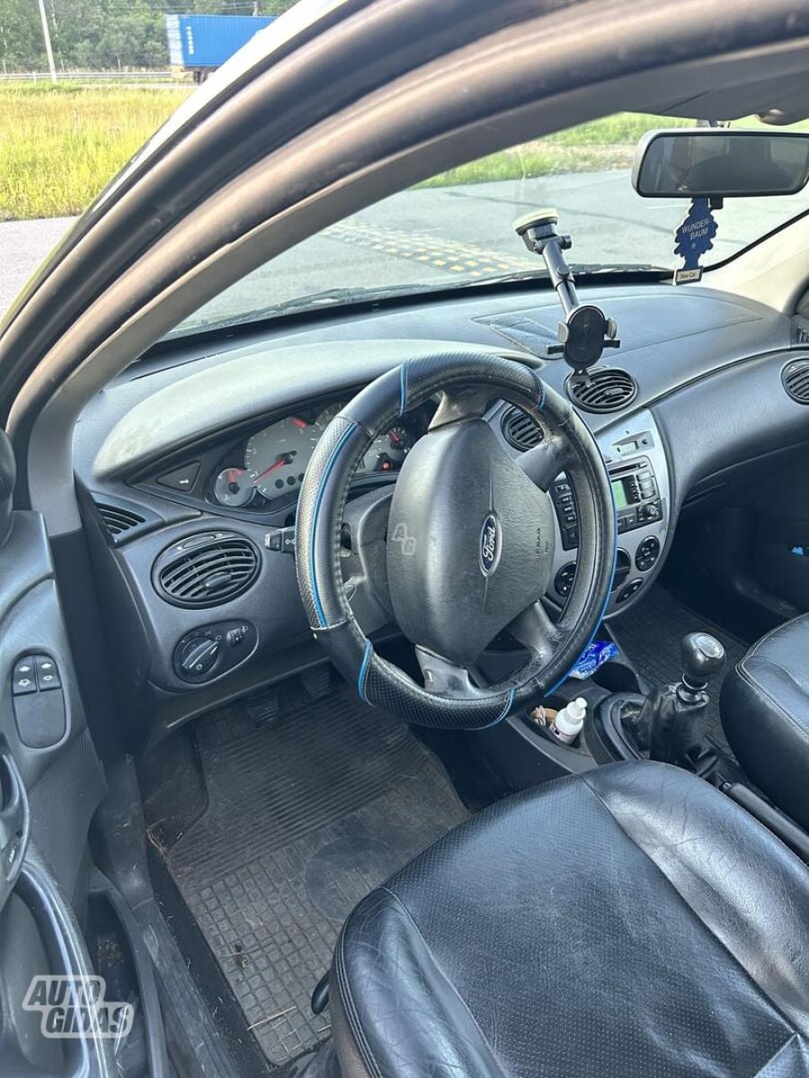 Black Ford Focus 2004 in Kaunas, with an engine capacity of 1.80 L and mileage of 321 thousand km for 499 €, photo 10 on AUTOMOTO.COM.LV