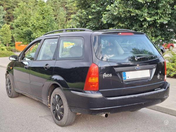 Black Ford Focus 2004 in Vilnius, with an engine capacity of 1.80 L and mileage of 276 thousand km for 300 €, photo 4 on AUTOMOTO.COM.LV