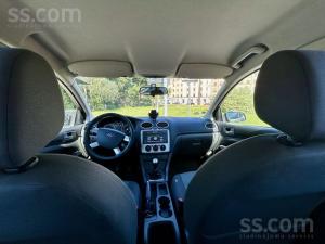 Black Ford Focus 2007 in Riga, with an engine capacity of 1.60 L and mileage of 242 thousand km for 1500 €, photo 9 on AUTOMOTO.COM.LV