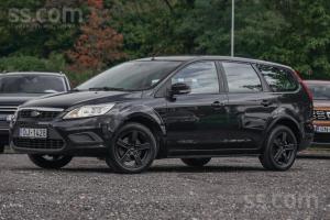 Black Ford Focus 2009 in Riga, with an engine capacity of 1.60 L and mileage of 223 thousand km for 1990 €, photo 1 on AUTOMOTO.COM.LV