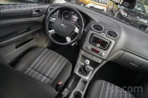Black Ford Focus 2009 in Riga, with an engine capacity of 1.60 L and mileage of 223 thousand km for 1990 €, photo 8 on AUTOMOTO.COM.LV