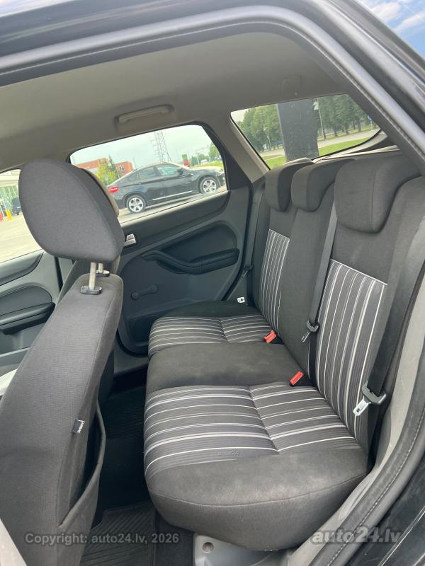 Black Ford Focus 2009 in Narva, with an engine capacity of 1.60 L and mileage of 320 thousand km for 999 €, photo 9 on AUTOMOTO.COM.LV