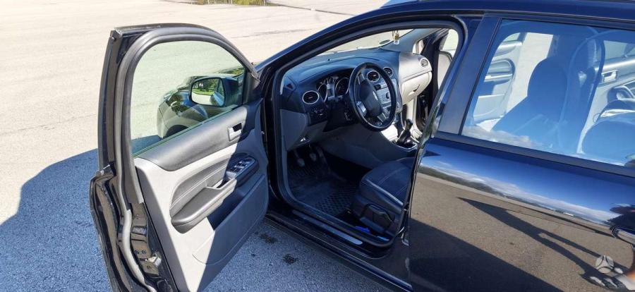 Black Ford Focus 2009 in Alytus, with an engine capacity of 1.56 L and mileage of 310 thousand km for 2100 €, photo 23 on AUTOMOTO.COM.LV